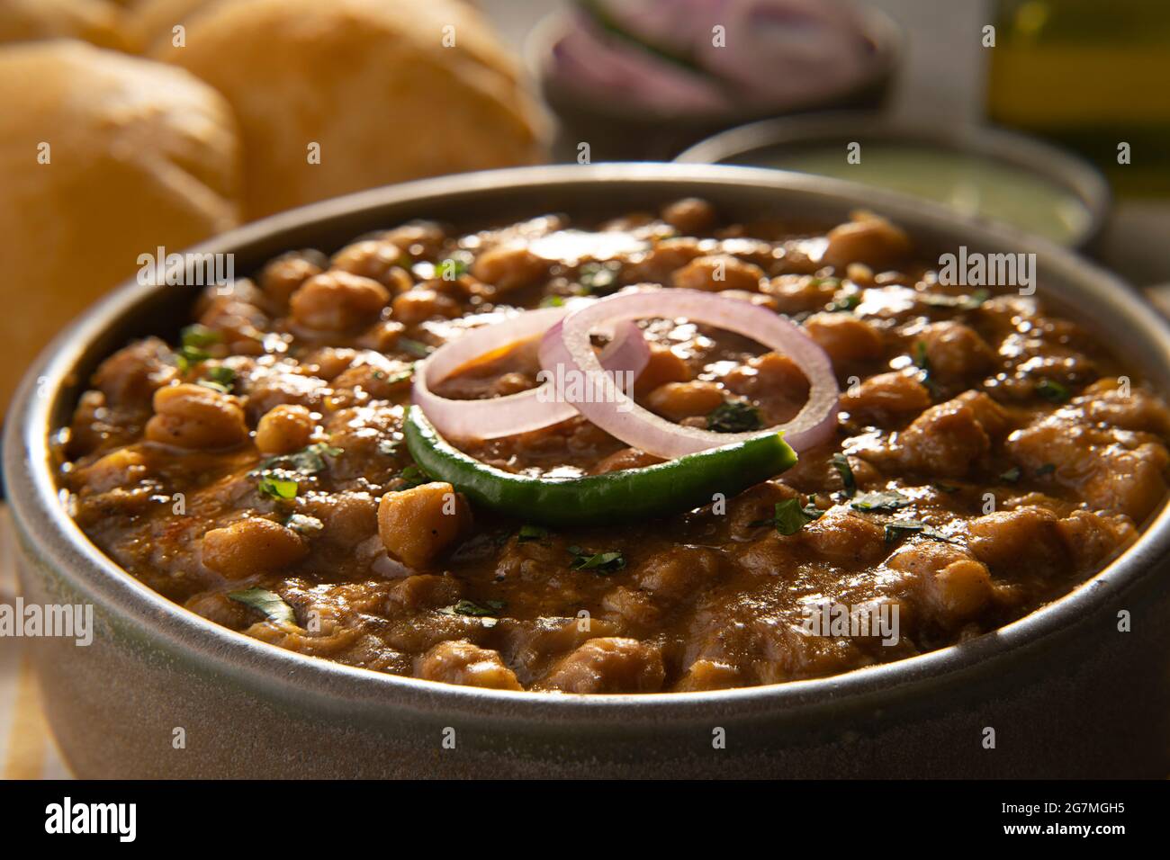 GARNISHED CHOLE CURRY SERVED HOT IN A KADHAI Stock Photo - Alamy