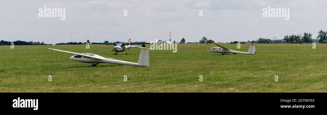 Gliders on the airfield waiting to go into the air. Aircrafts for ...