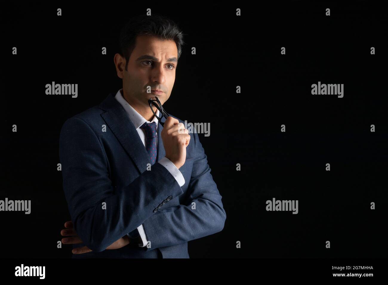 A CORPORATE PROFESSIONAL STANDING AND THINKING Stock Photo - Alamy