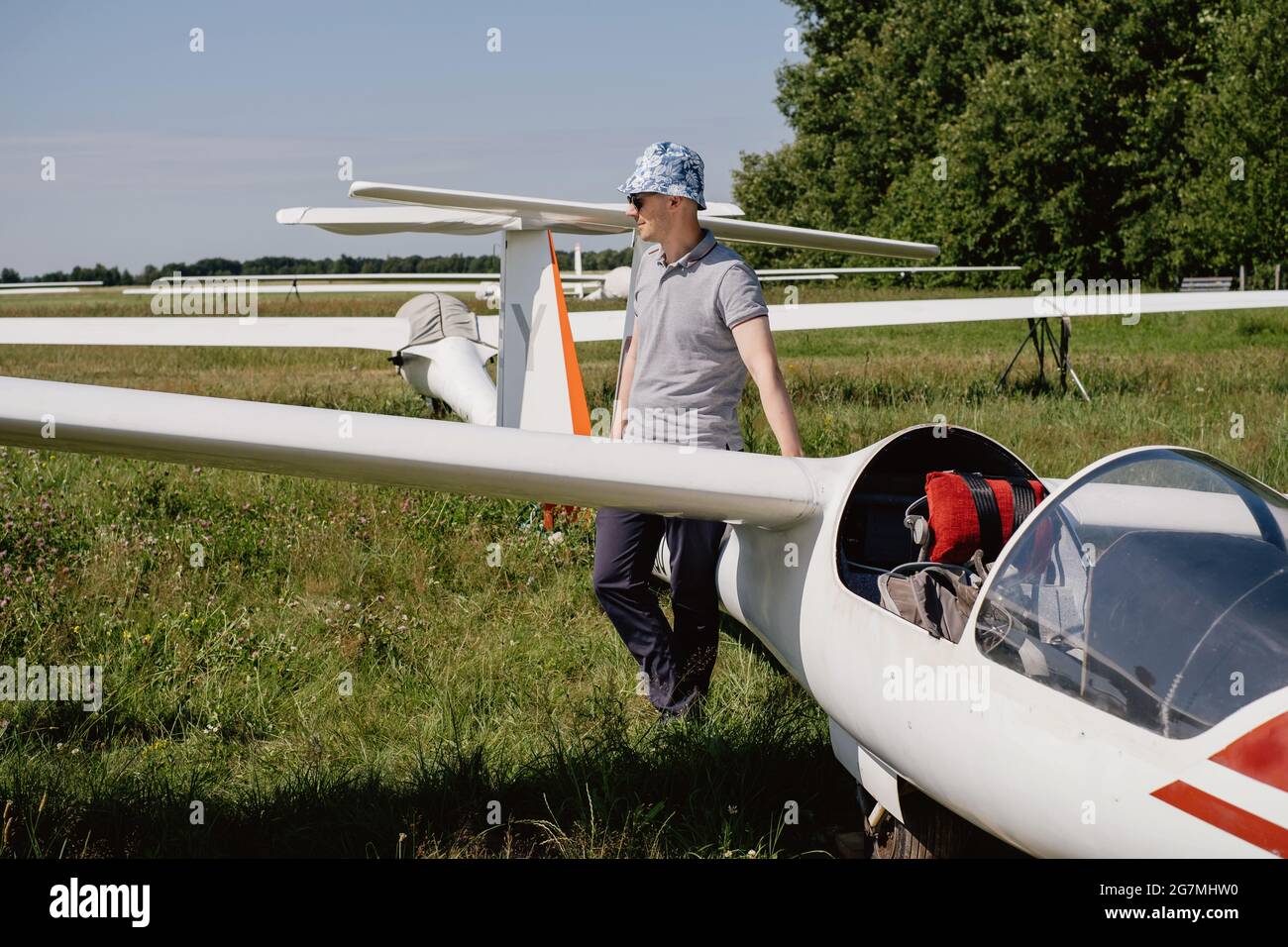Glider pilot getting ready for flight on fixed-wing aircraft from ...