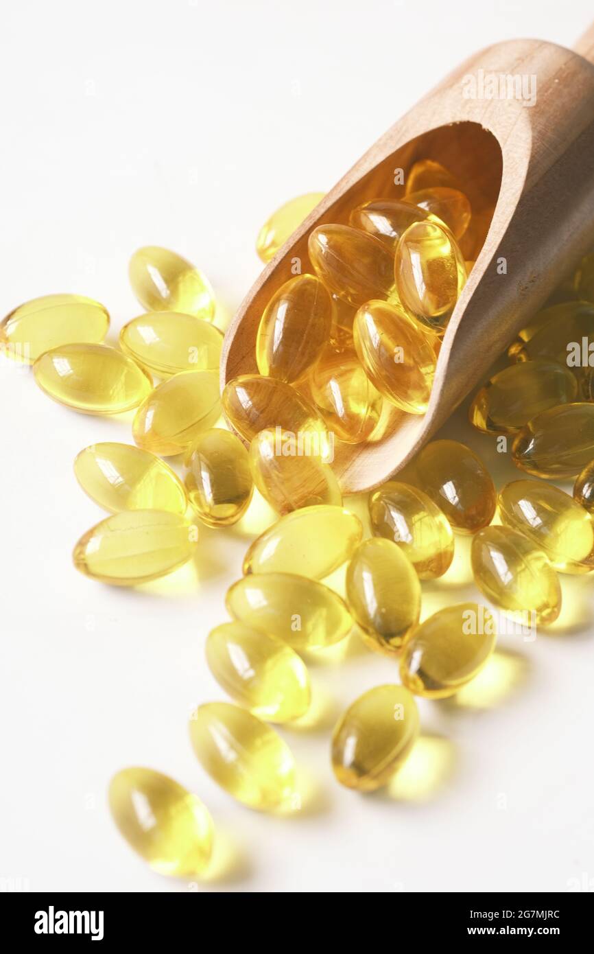 fish oil supplement on white background Stock Photo - Alamy