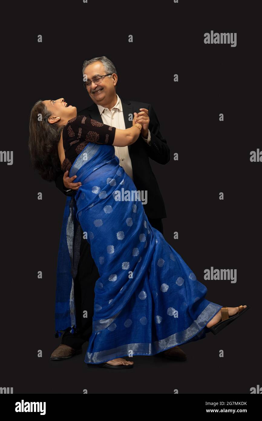 Old woman dancing laughing hi-res stock photography and images - Alamy