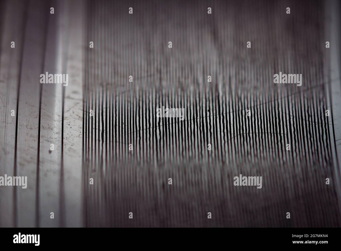 Macro shot of black vinyl record showing scratches. Surface of an old ...