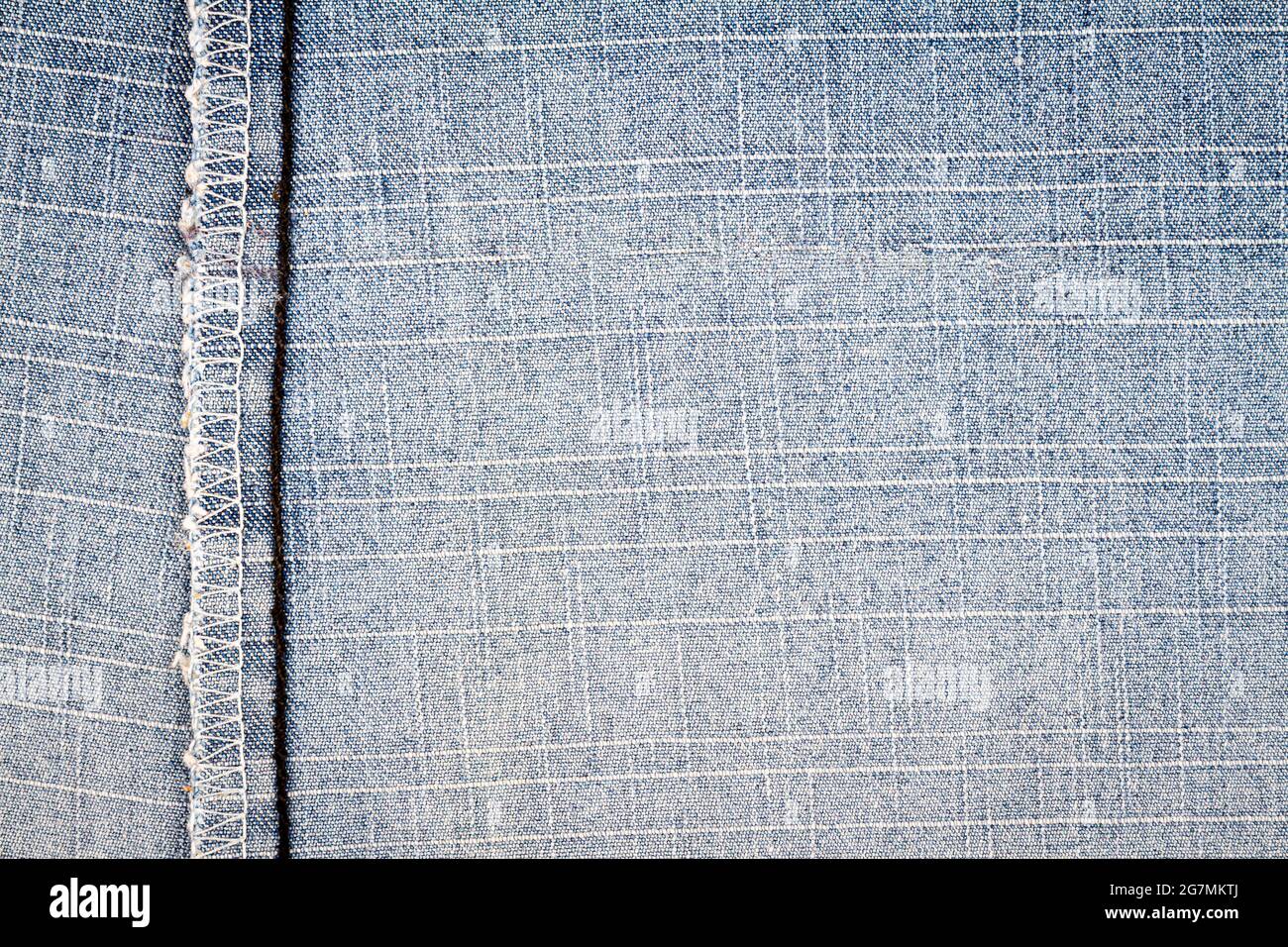 Backside side of jeans fabric with back seam Stock Photo - Alamy