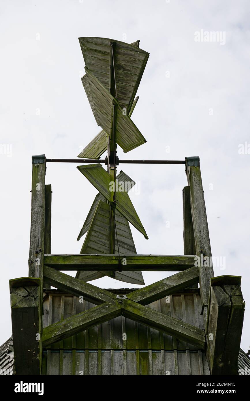 Close up of a wind turbine on an old mill. Wooden construction of a ...