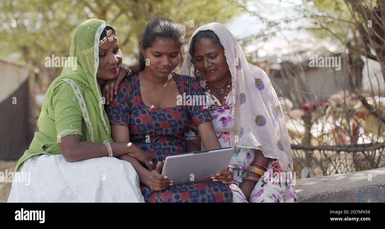 Indian family having a video call with a relative Stock Photo - Alamy