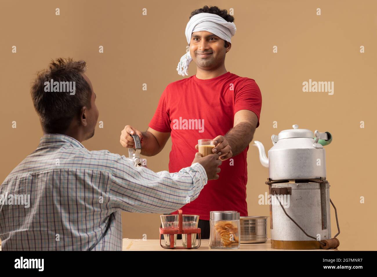Serving tea to customer hi-res stock photography and images - Alamy