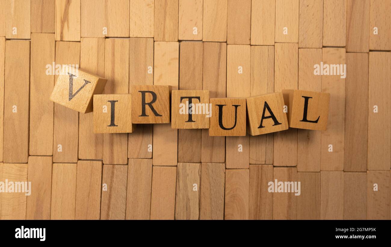 The word virtual was created from wooden cubes. Technology and life ...