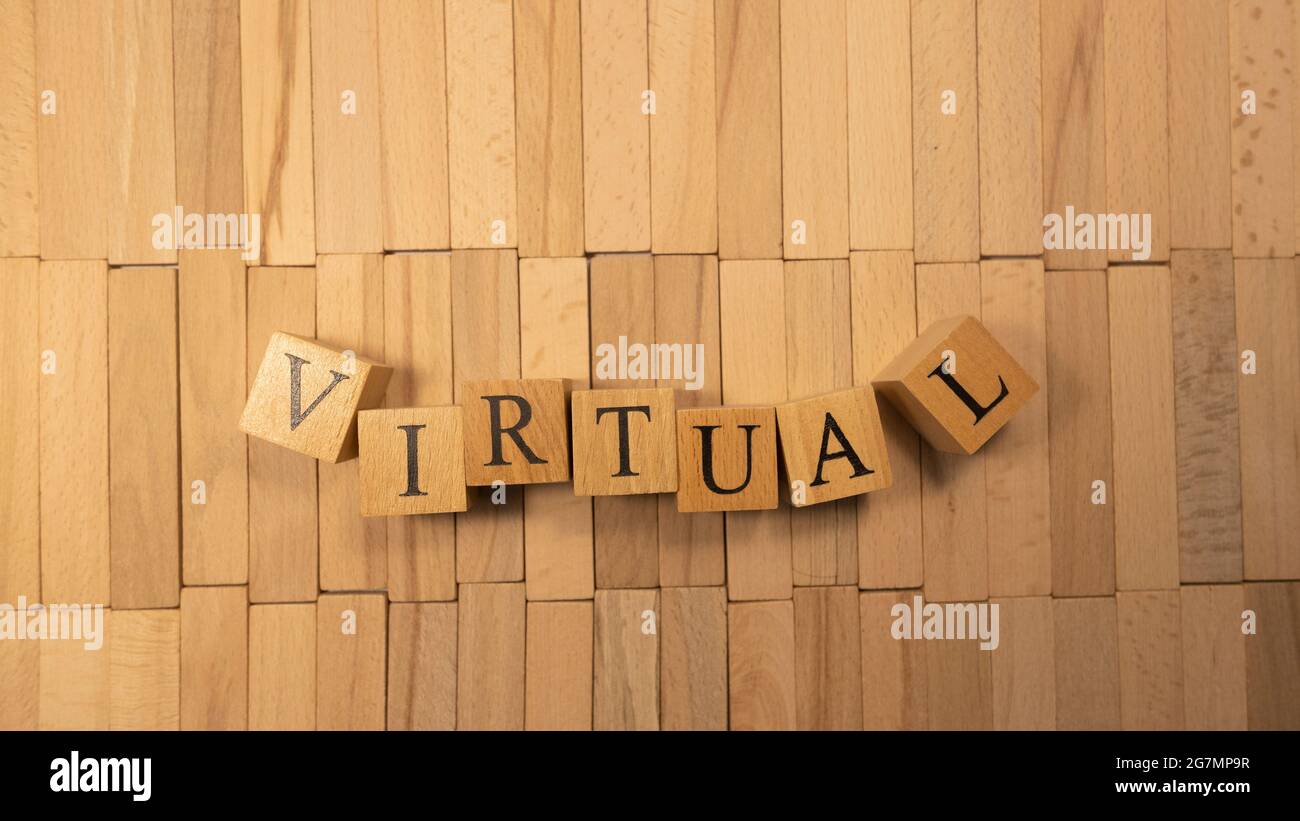 The word virtual was created from wooden cubes. Technology and life ...