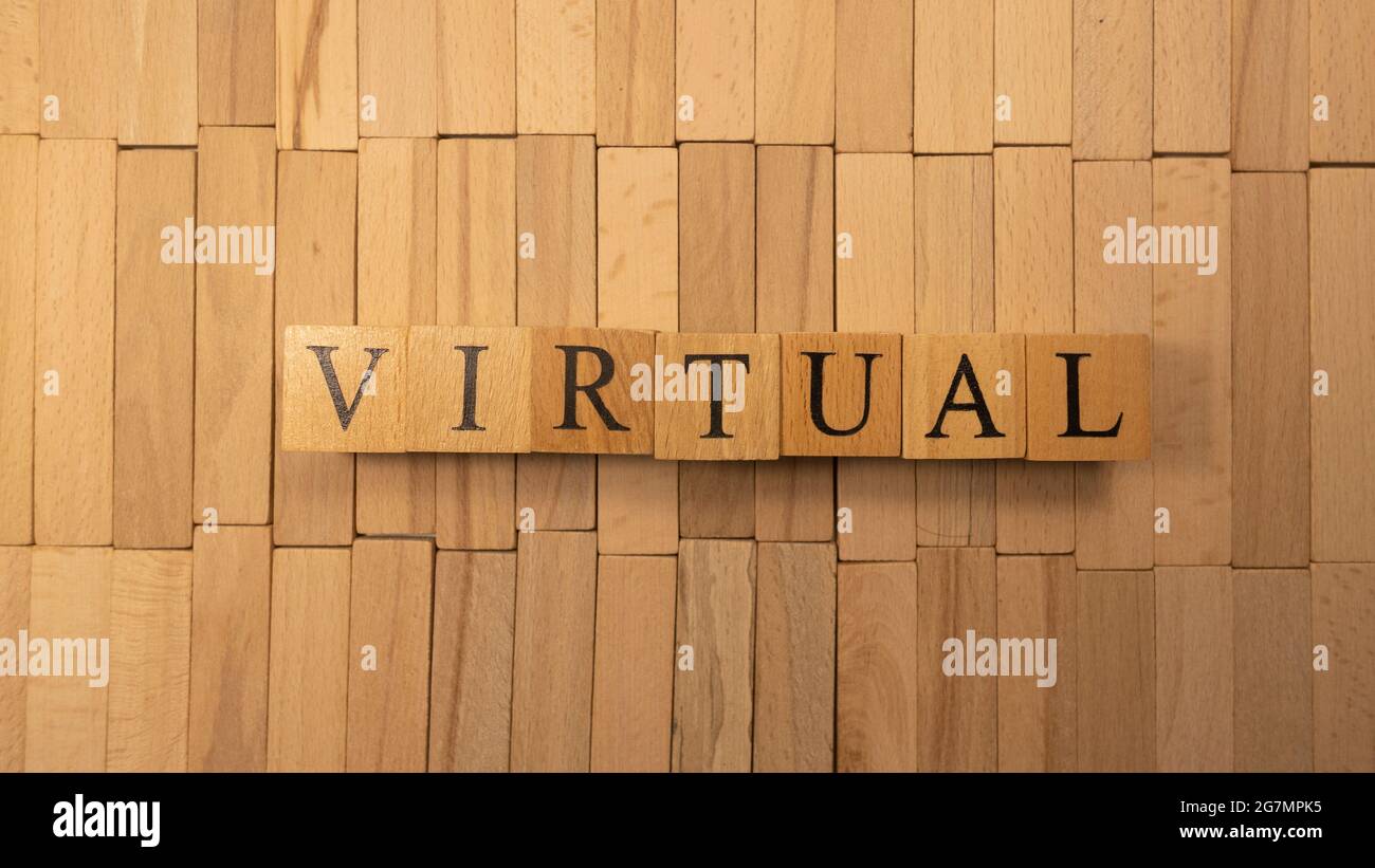 The word virtual was created from wooden cubes. Technology and life ...