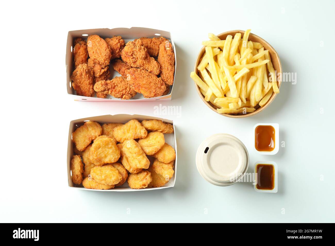 Concept of fast food on white background Stock Photo - Alamy