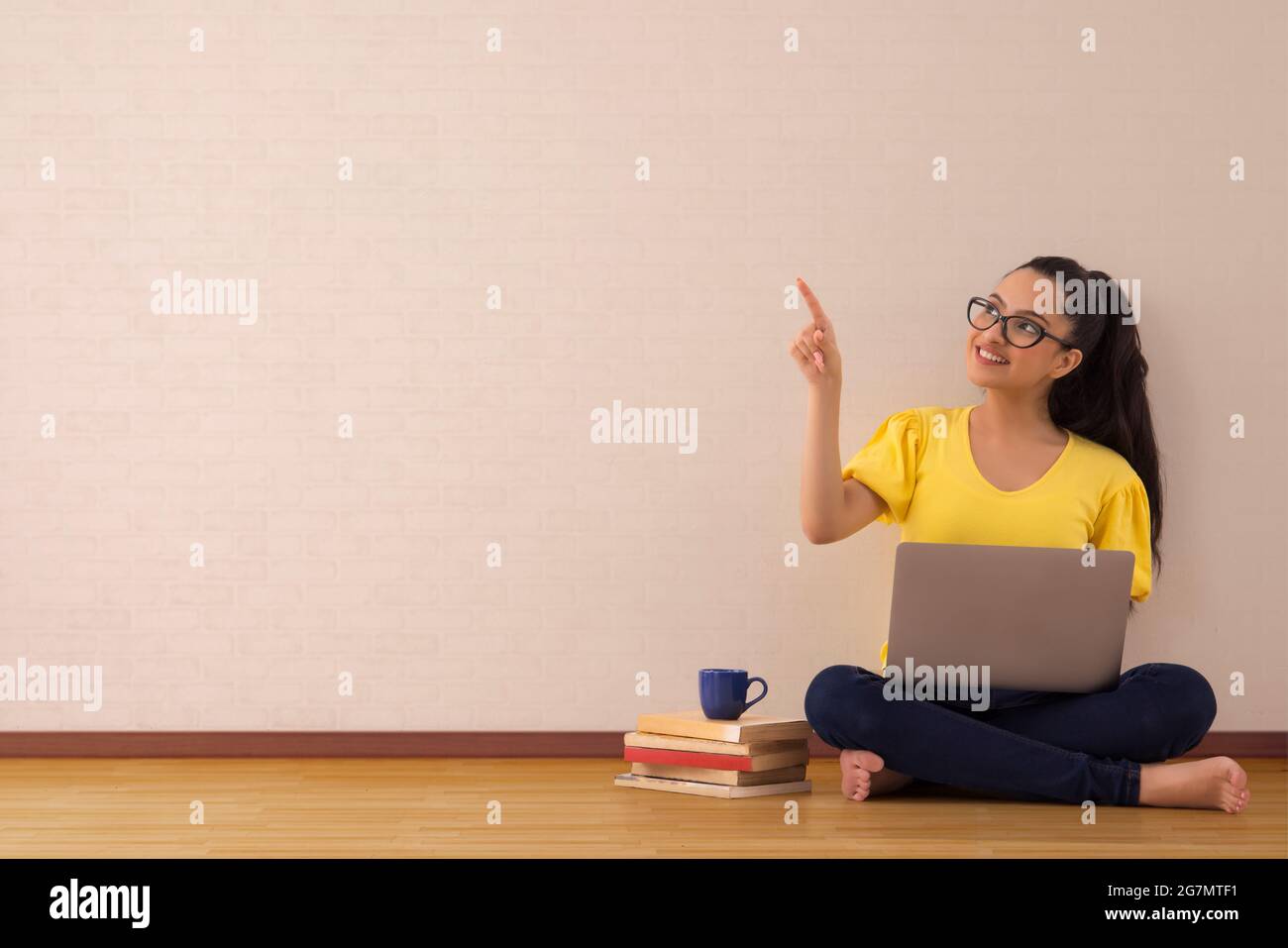 Woman pointing finger house hi-res stock photography and images - Alamy