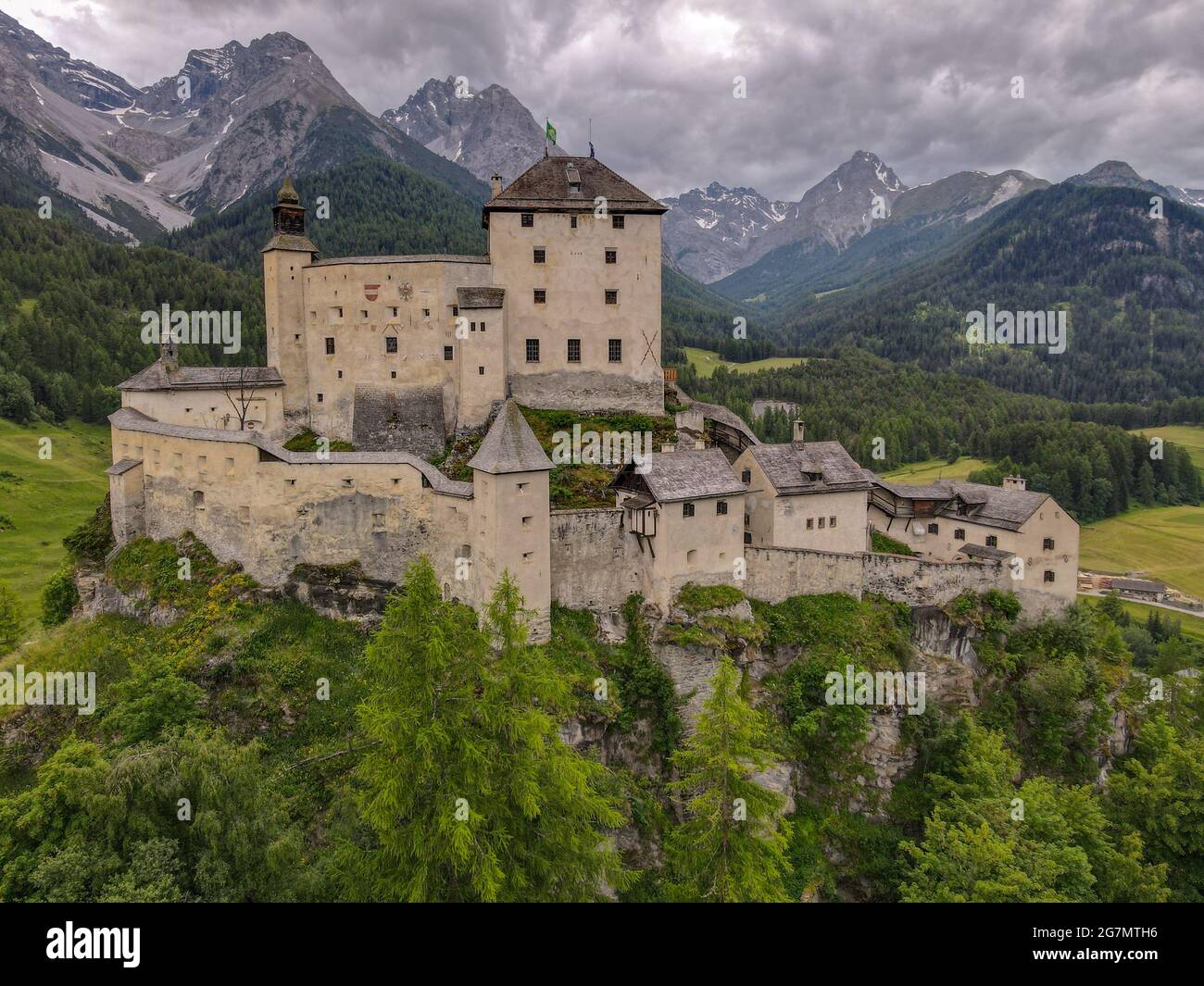 Drone view at Tarasp castle on the Swiss alps Stock Photo - Alamy