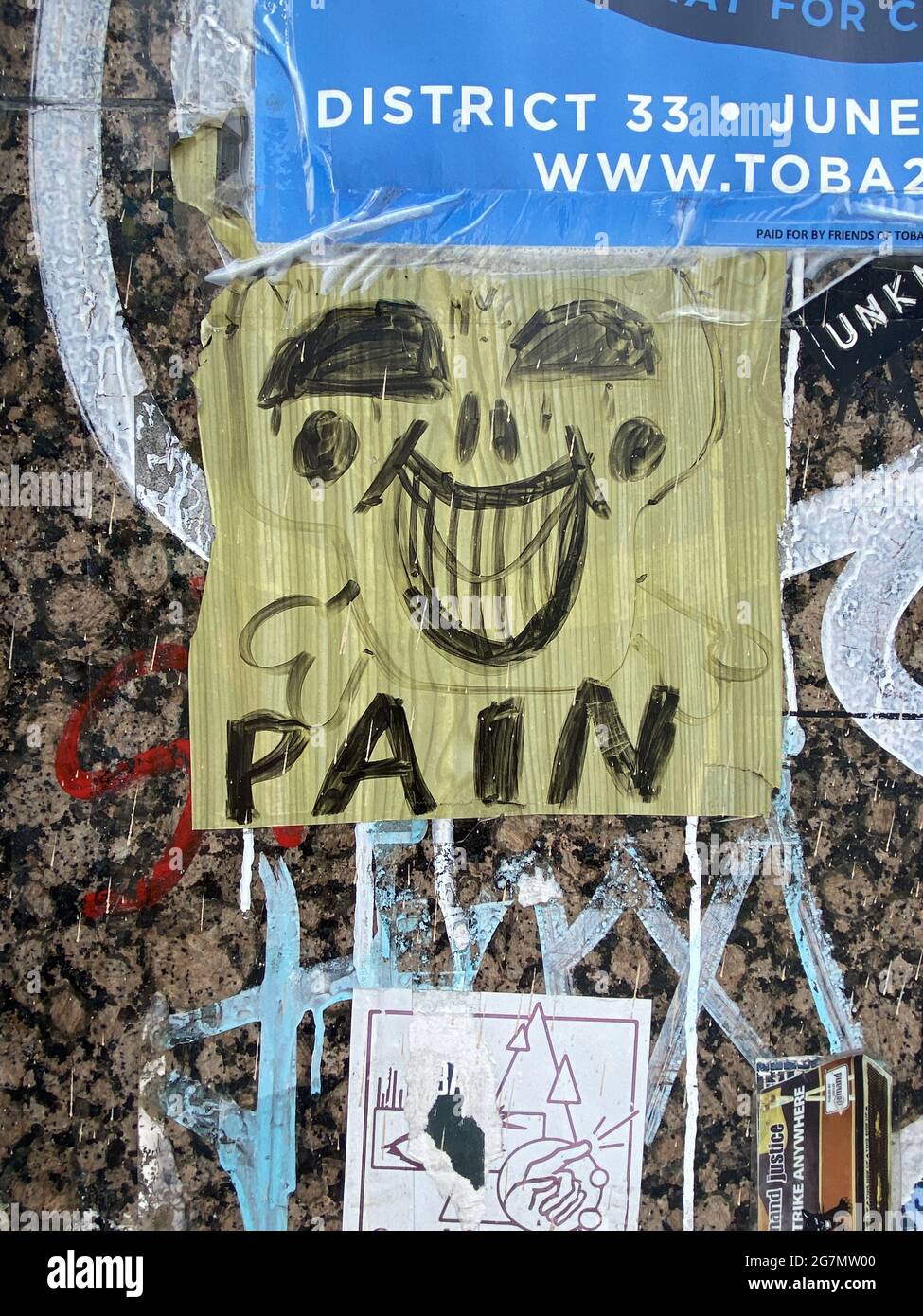 Found wall art; mixture of graffiti, posters and drawing. NYC Stock ...