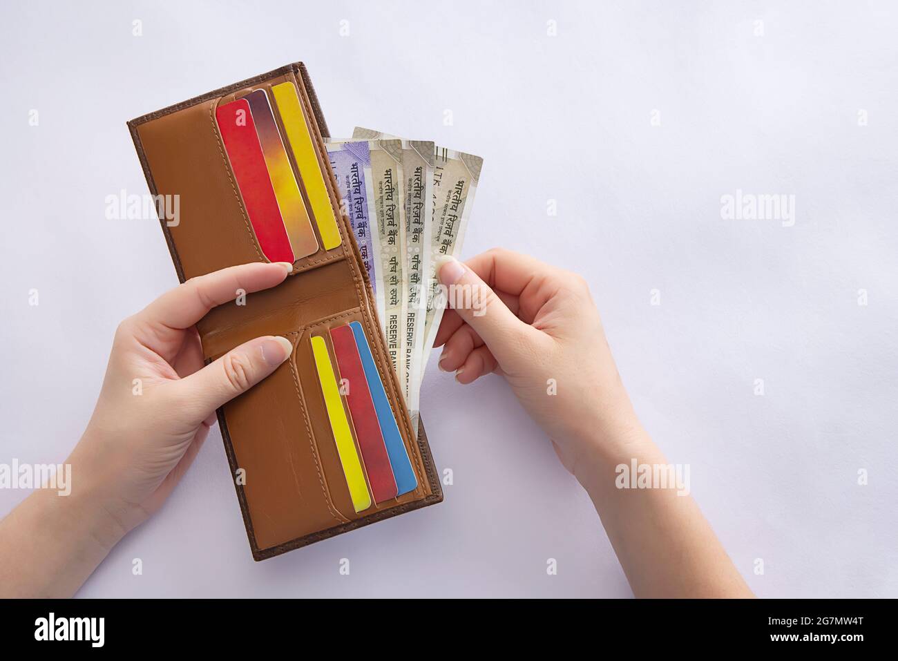 Notes and cards in a wallet Stock Photo - Alamy