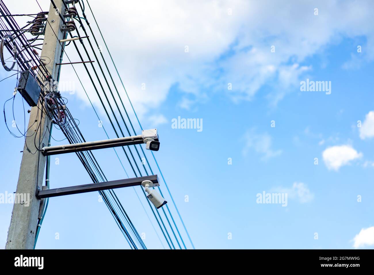 cctv camera is installed on the Metal stick that hung on to electric ...