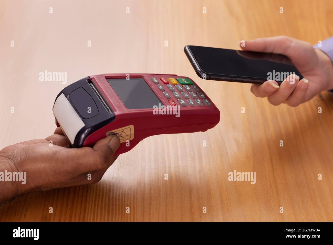 Two hands holding phone hi-res stock photography and images - Alamy