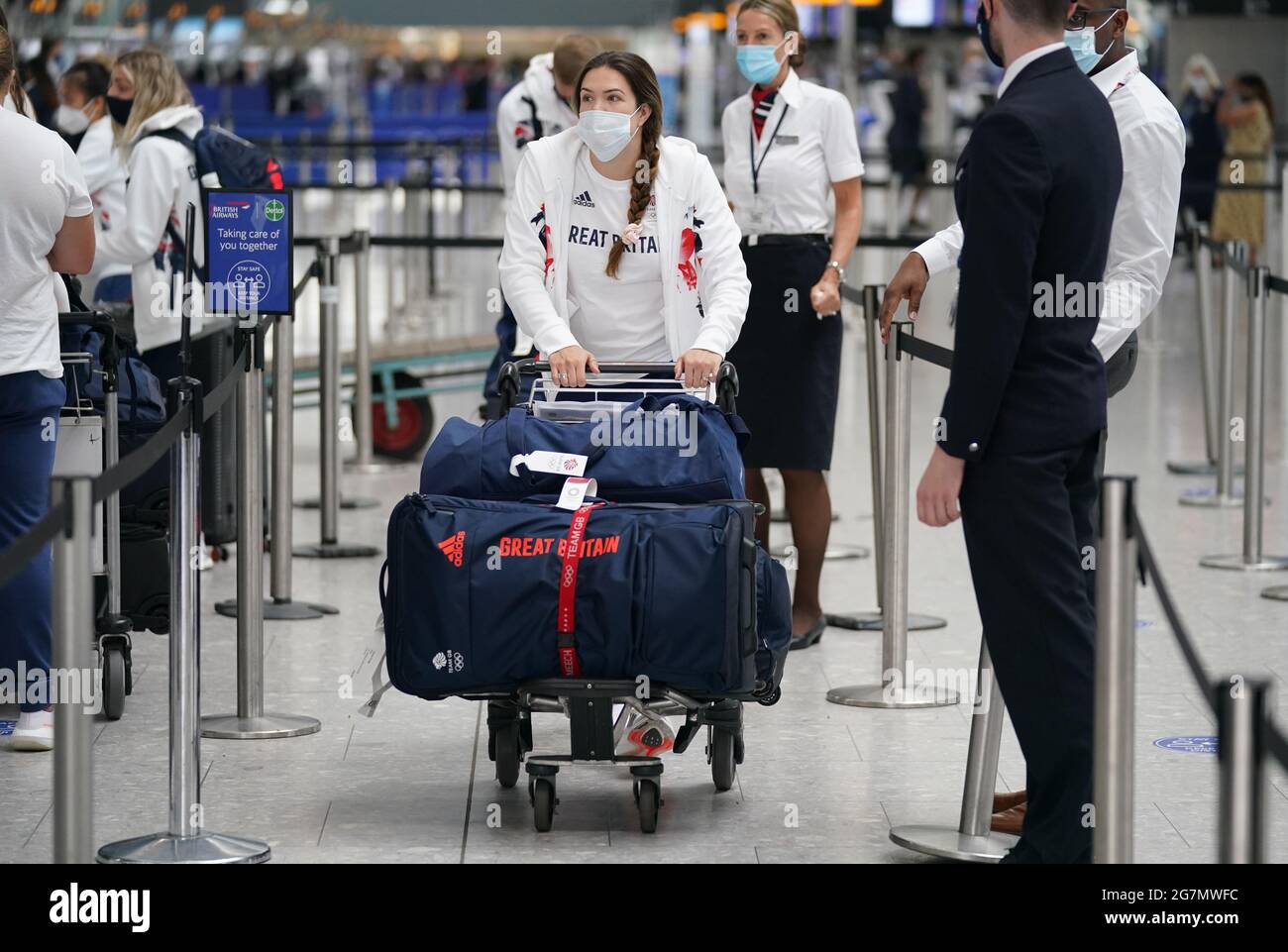 Members of Team GB check in at Heathrow Terminal 5 before they depart ...