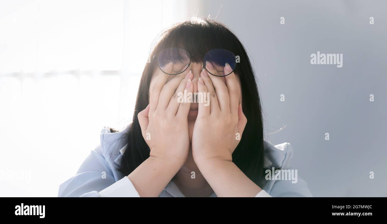 Glasses Asian Thai - Chinese woman is shying and crying face behind her ...