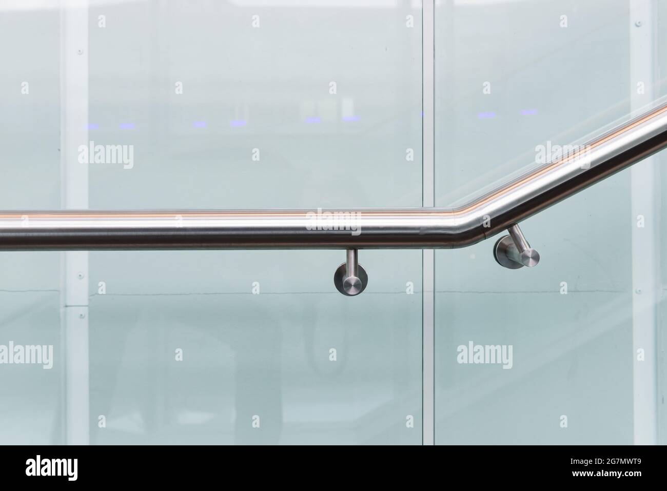 Metal handrail with fasteners on the protective glass panel Stock Photo ...
