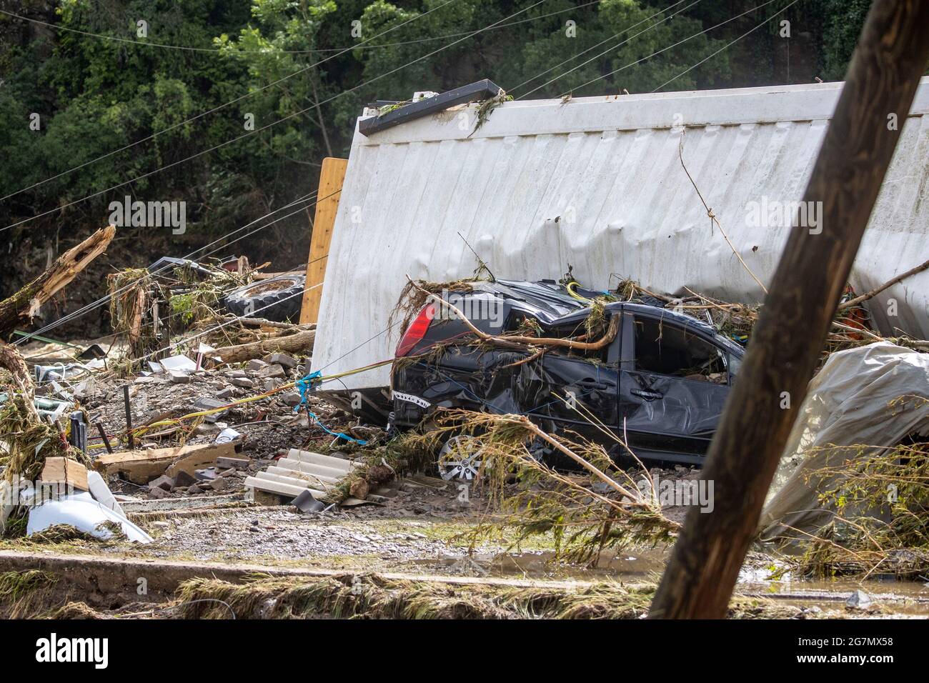 Schuld, Germany. 15th July, 2021. Debris lies in front of a house in ...