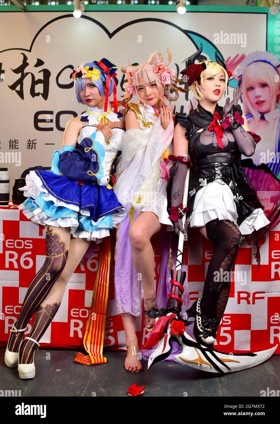 Cosplayers are posing during the first day of CCG EXPO, the CCG EXPO 2021 kicks off at Shanghai ...