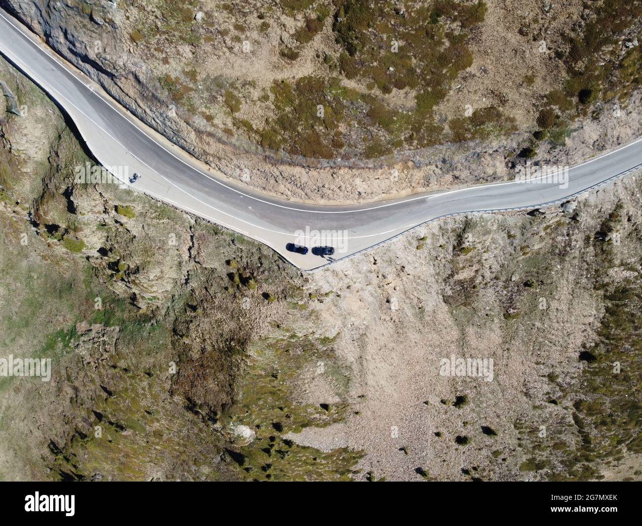 Aerial top view of cars driving on a mountain road Stock Photo - Alamy