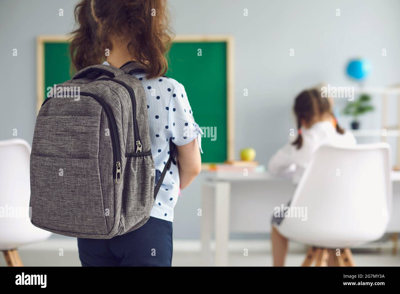 School girl back view uniform hi-res stock photography and images - Alamy