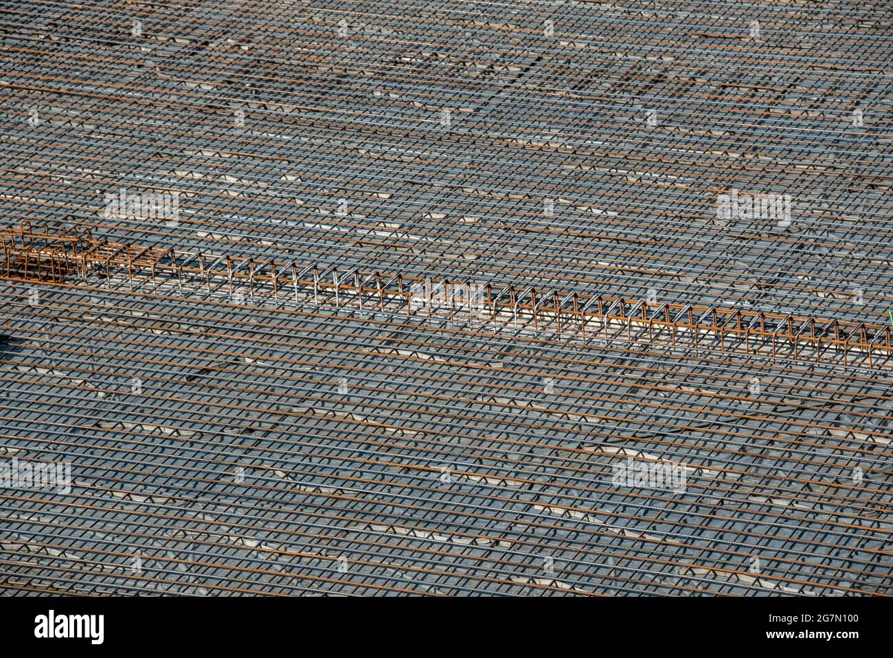 flooring at a construction site, base plate reinforced with steel rods ...