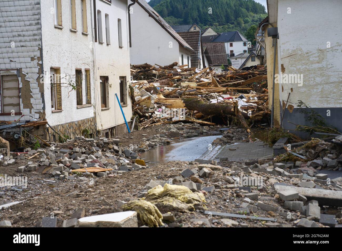Schuld, Germany. 15th July, 2021. Debris lies piled up on a street in ...