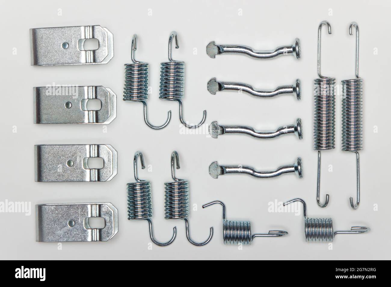 Repair kit for brakes, several metal springs, pins, limiters - clamps ...