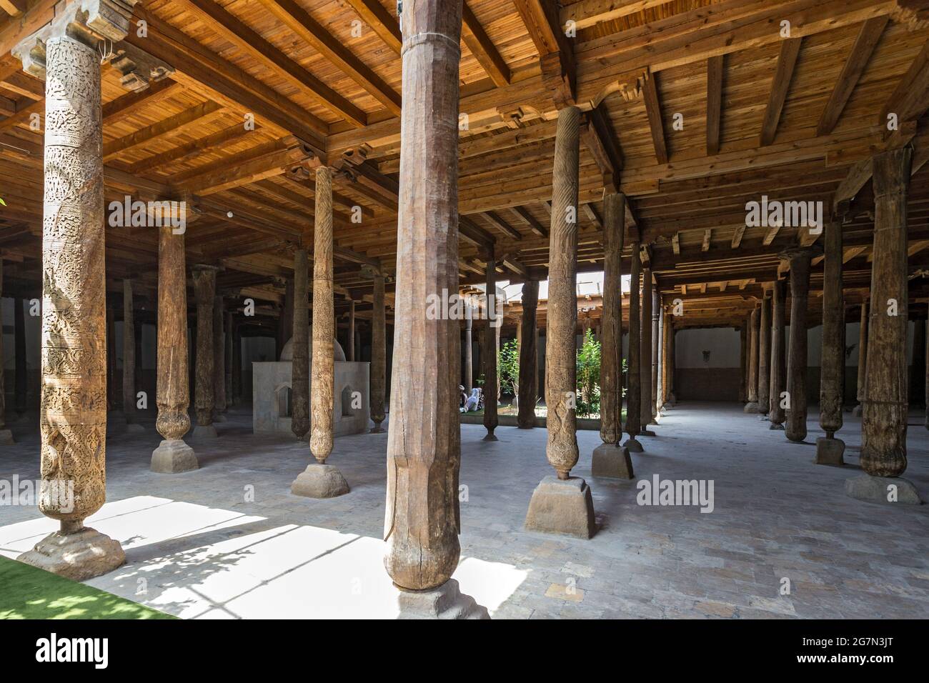 Interior of Friday or Djuma Mosque, showing ornate carved pillars ...