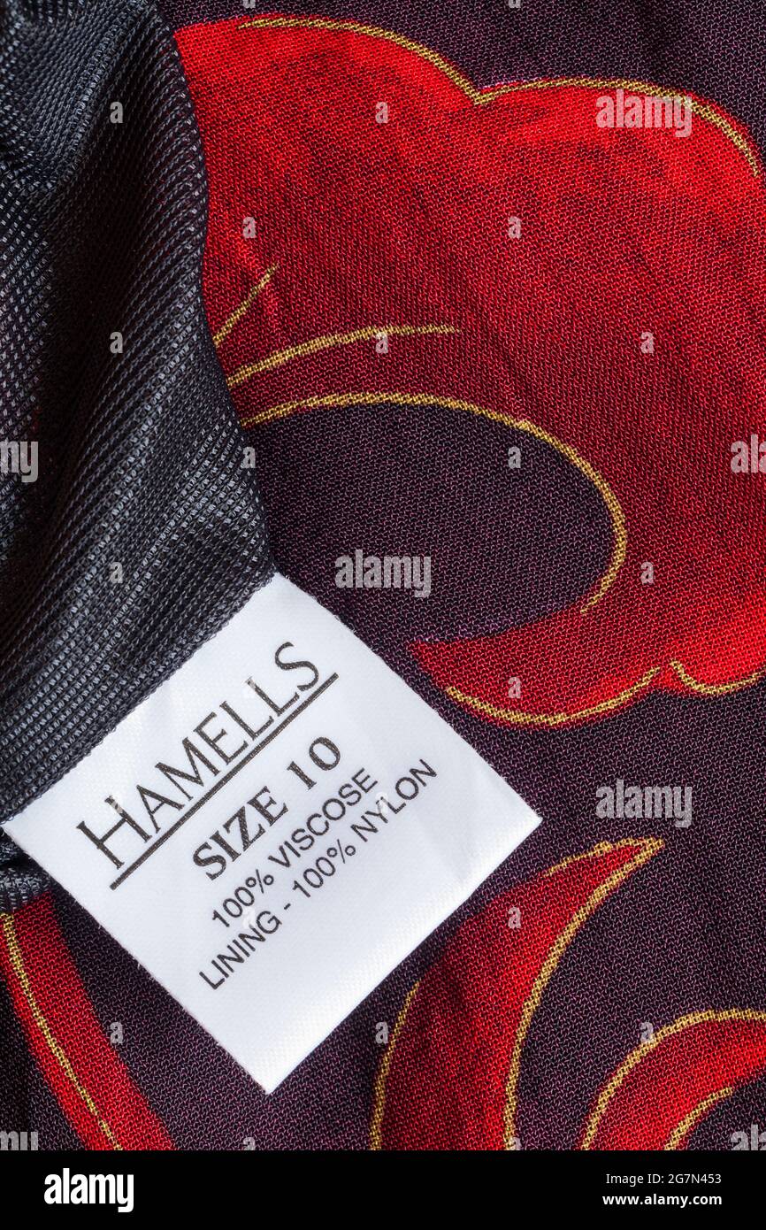 label - Hammells label in woman's dress black and red clothing garment ...