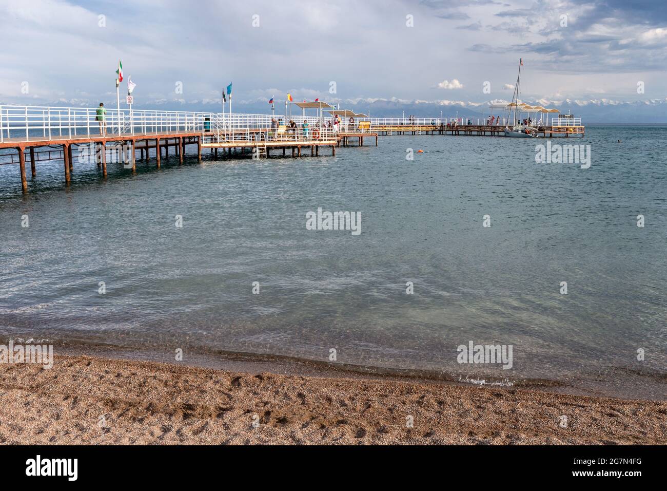 Pier, Kapriz Issyk Kul Resort lake, Kyrgyzstan Stock Photo - Alamy