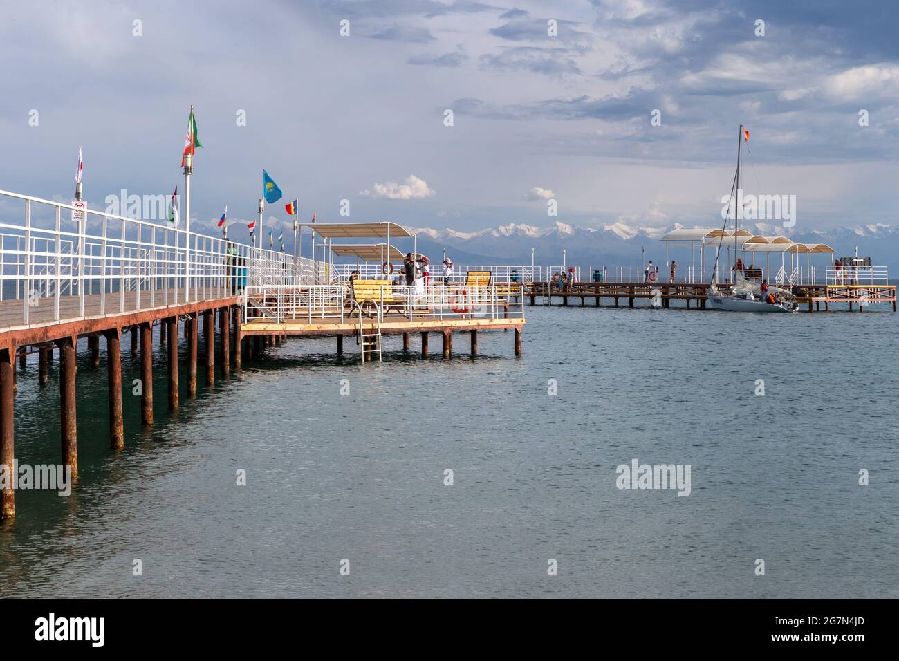 Pier, Kapriz Issyk Kul Resort lake, Kyrgyzstan Stock Photo - Alamy