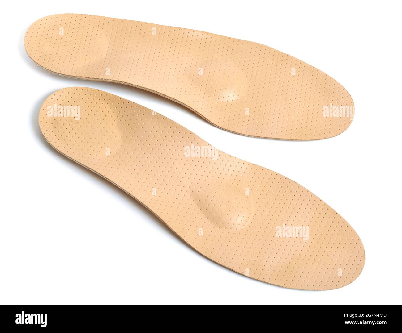 A pair of orthopedic insoles. Isolated on white background Stock Photo ...