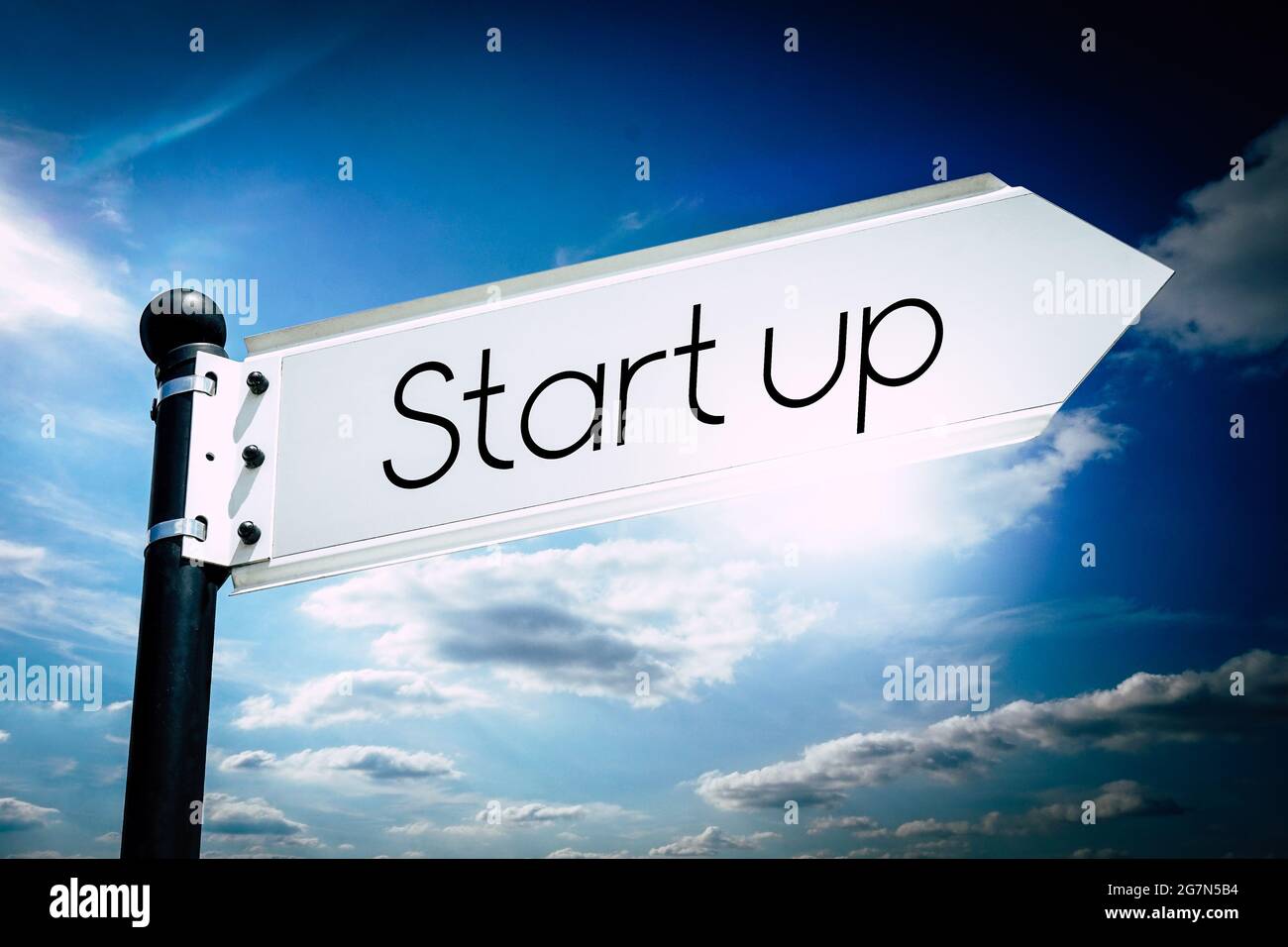 Start up - signpost with one arrow, sky in background Stock Photo - Alamy
