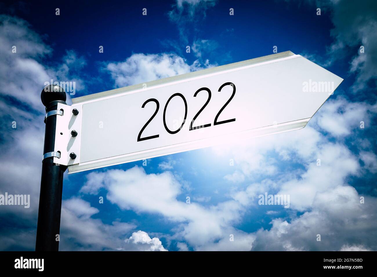 2022 - signpost with one arrow, sky in background Stock Photo - Alamy