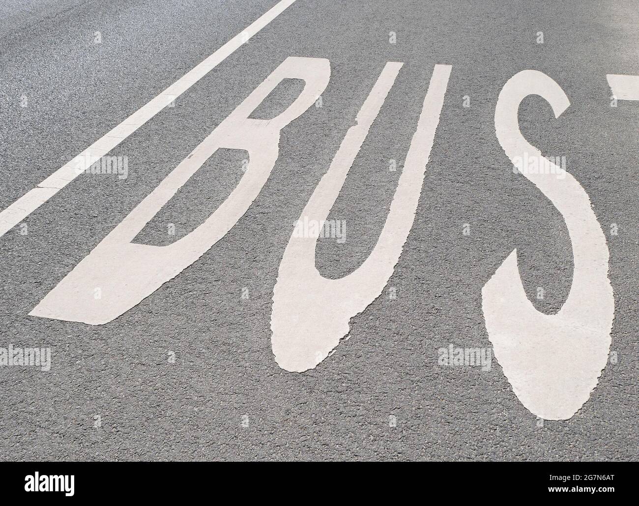 Bus lane on the road in the city Stock Photo - Alamy