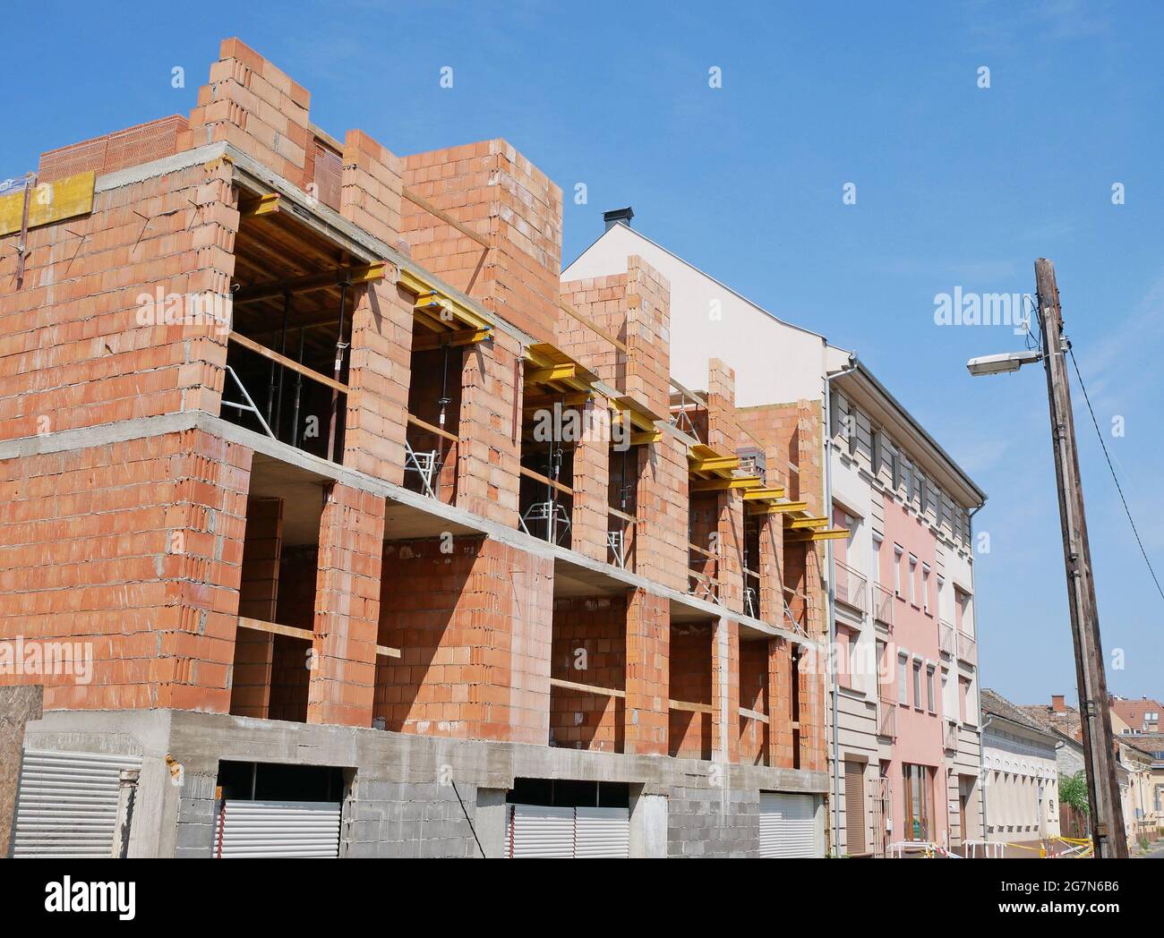 Construction of a new apartment building Stock Photo - Alamy