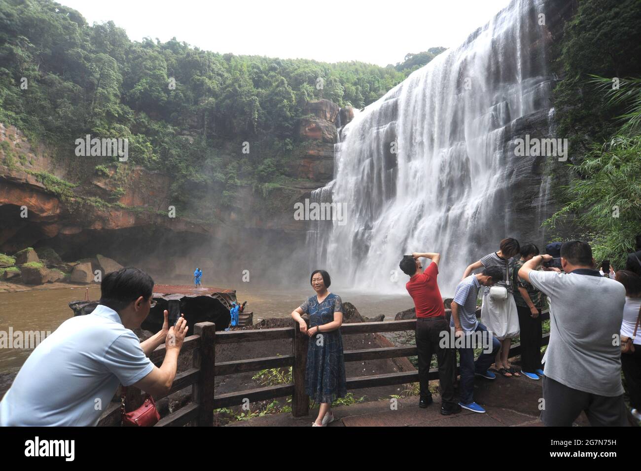 CHISHUI, CHINA - JULY 15, 2021 - Tourists visit Chishui Waterfall in ...