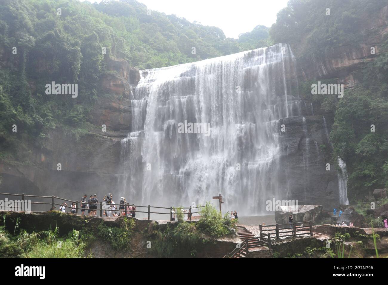CHISHUI, CHINA - JULY 15, 2021 - Tourists visit Chishui Waterfall in ...