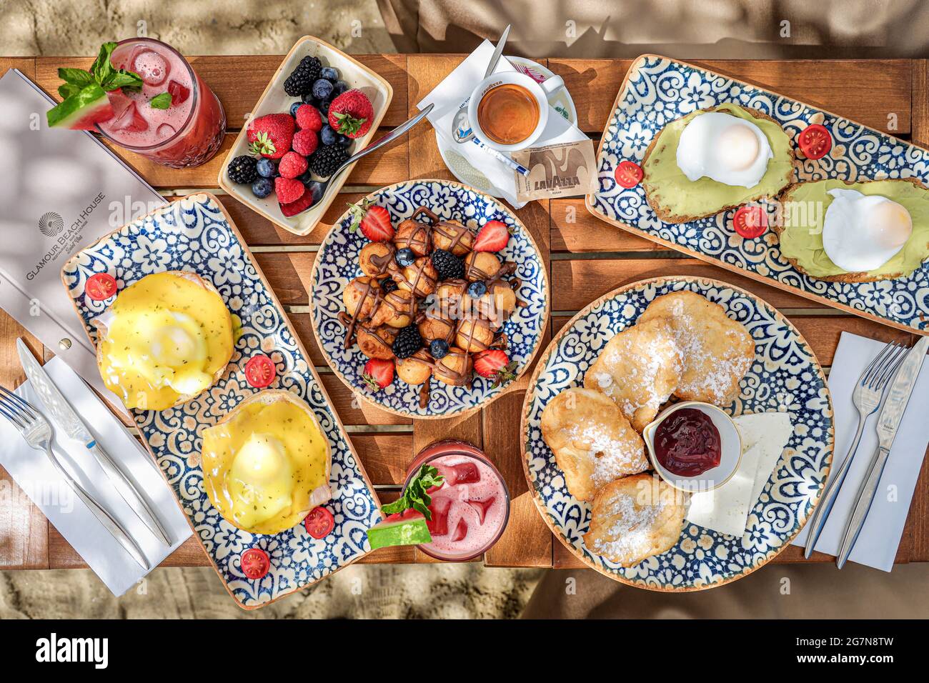 Top view of breakfast table with tasty desserts Stock Photo - Alamy
