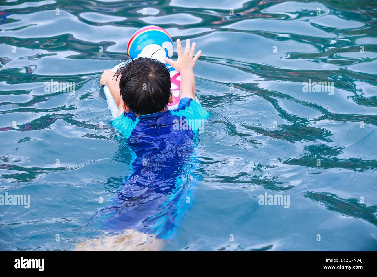 Kid Swimming Kick High Resolution Stock Photography and Images - Alamy