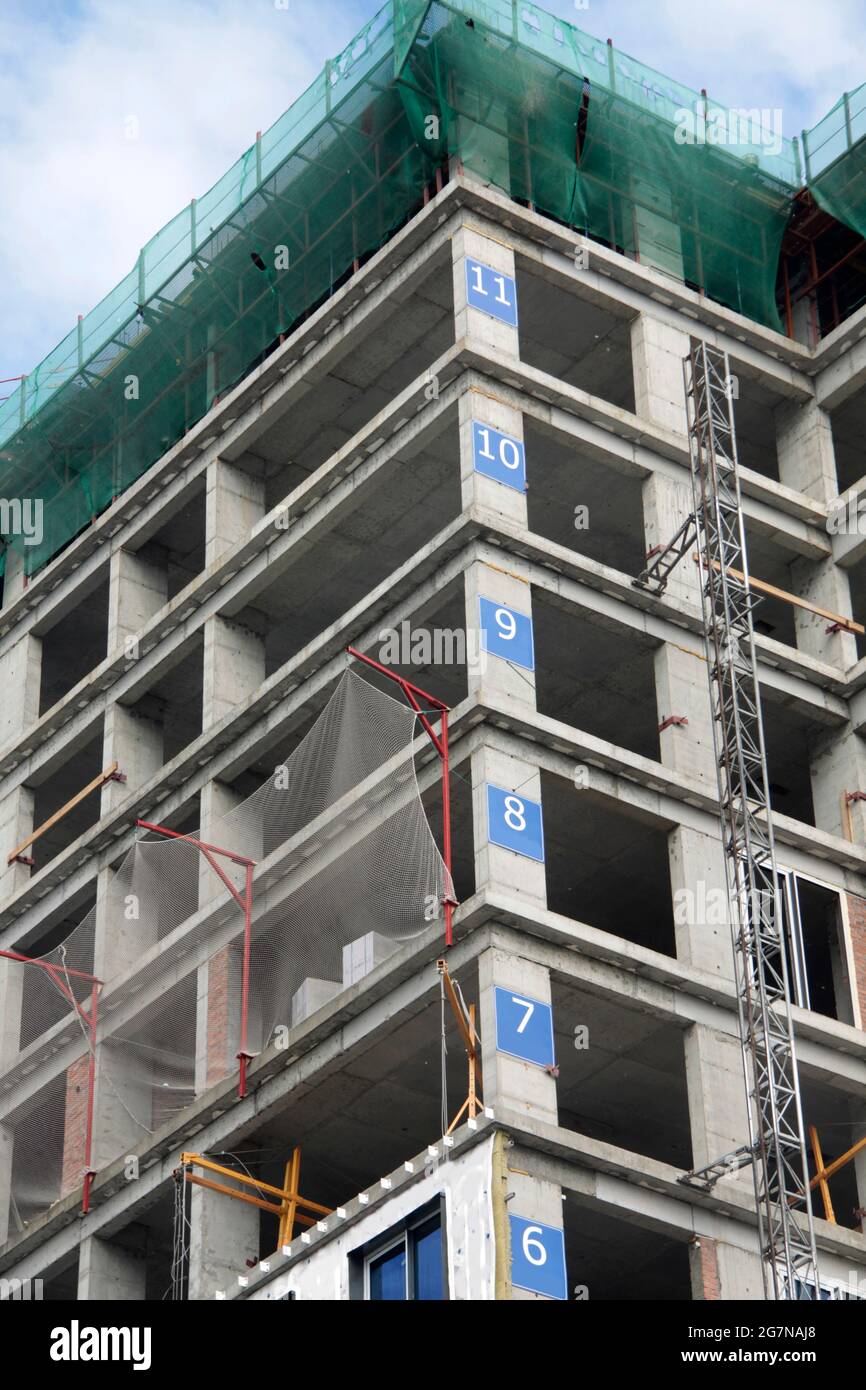 construction project - incompleted house with floor numeration ...