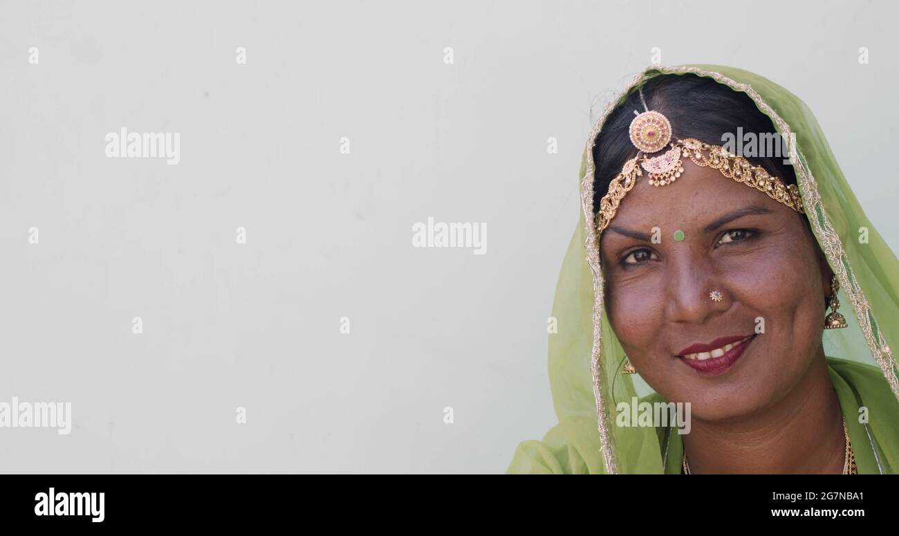 Indian female with traditional veil bindi and jewelry on white ...