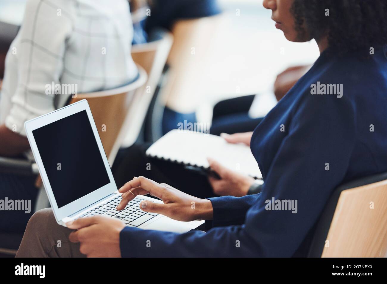 Sharing information with colleagues online Stock Photo - Alamy
