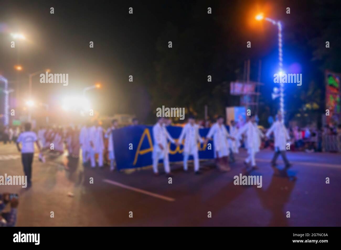 Blurred image of Bengali Hindu gentlemen dressed in whiite traditional ...