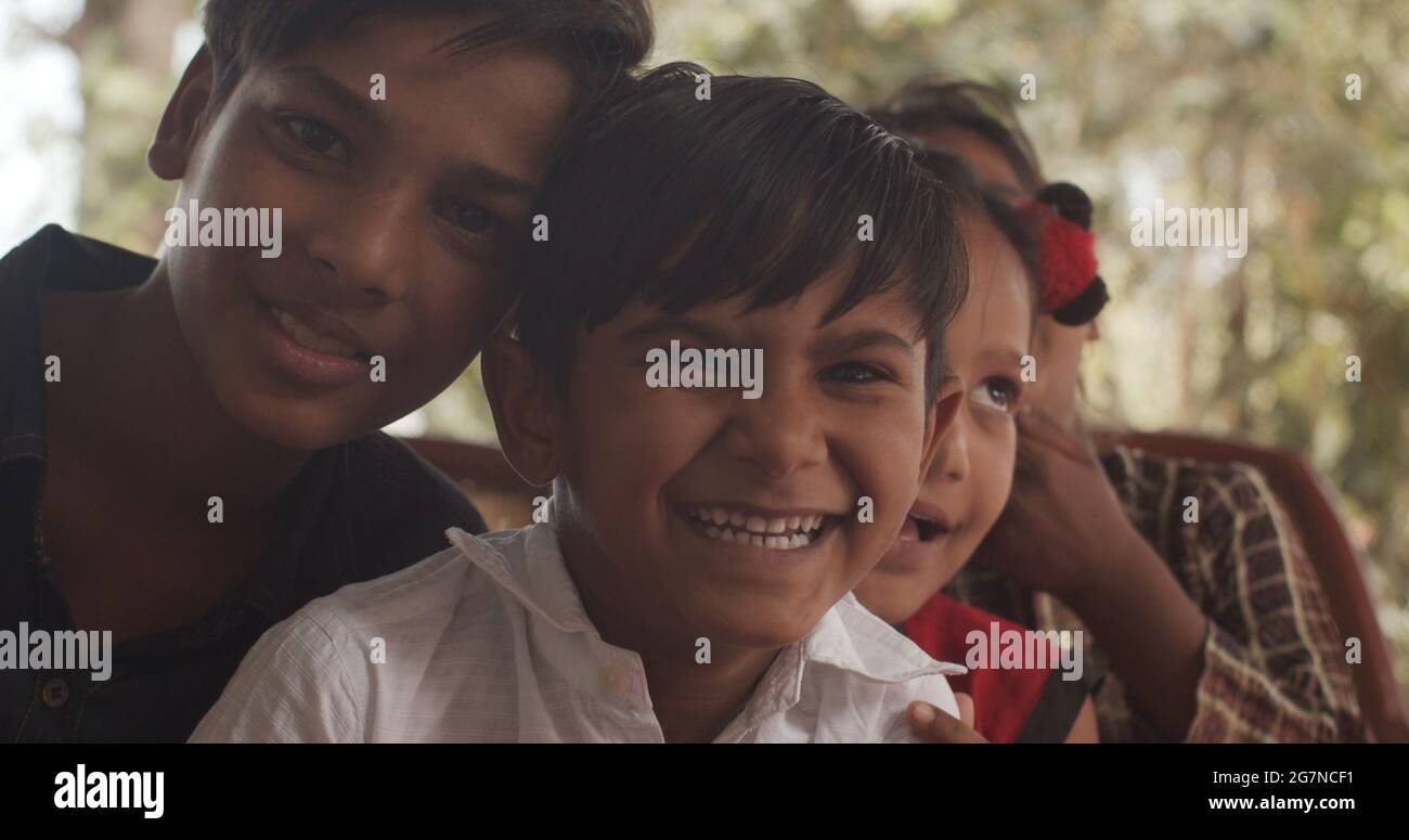 Portrait of cheerful young Indian boys Stock Photo - Alamy