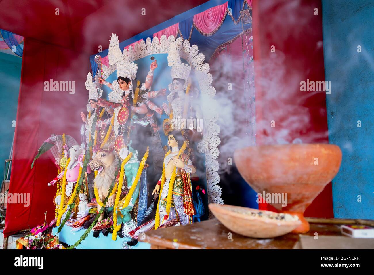 Holy smoke covering part of Goddess Durga idol at decorated Durga Puja ...